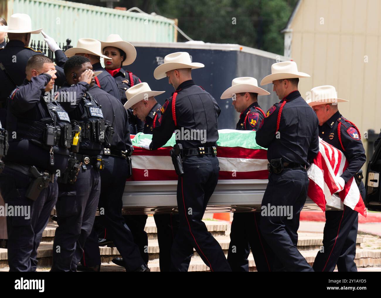 The casket of Harris County Precinct 4 Deputy Constables arrives as ...