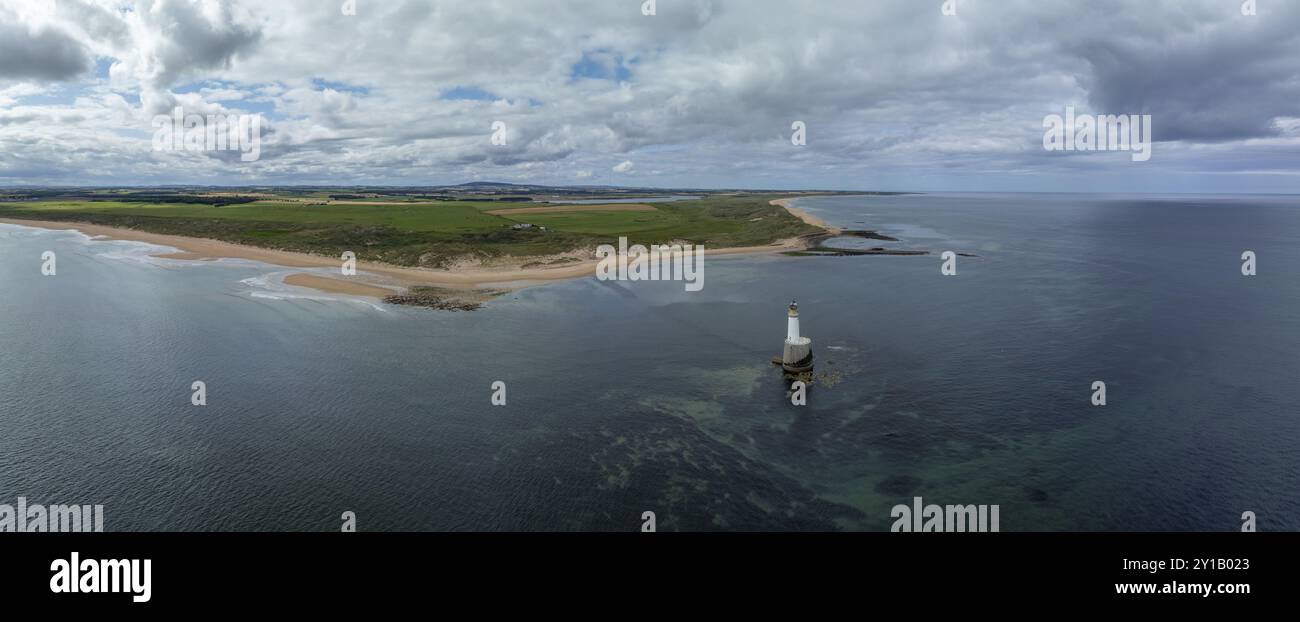 Lighthouse in the sea, drone shot, Rattray Head Lighthouse, Peterhead ...