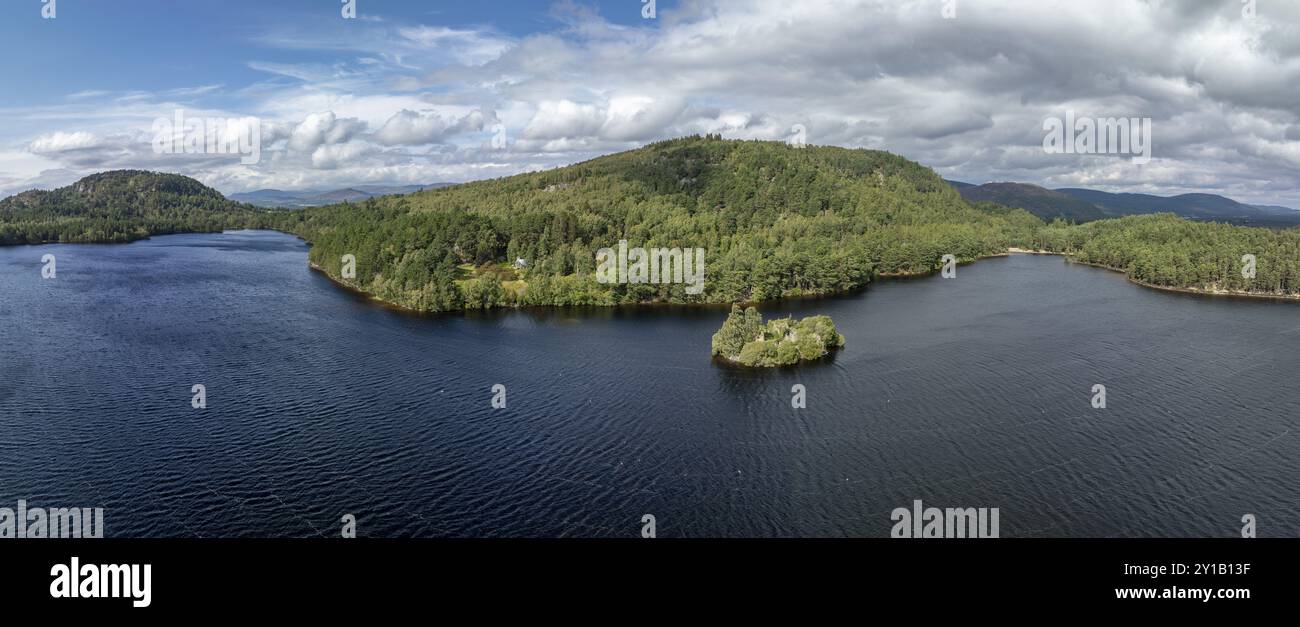 Loch at Eilein Castle, loch with island with castle ruins, drone shot ...