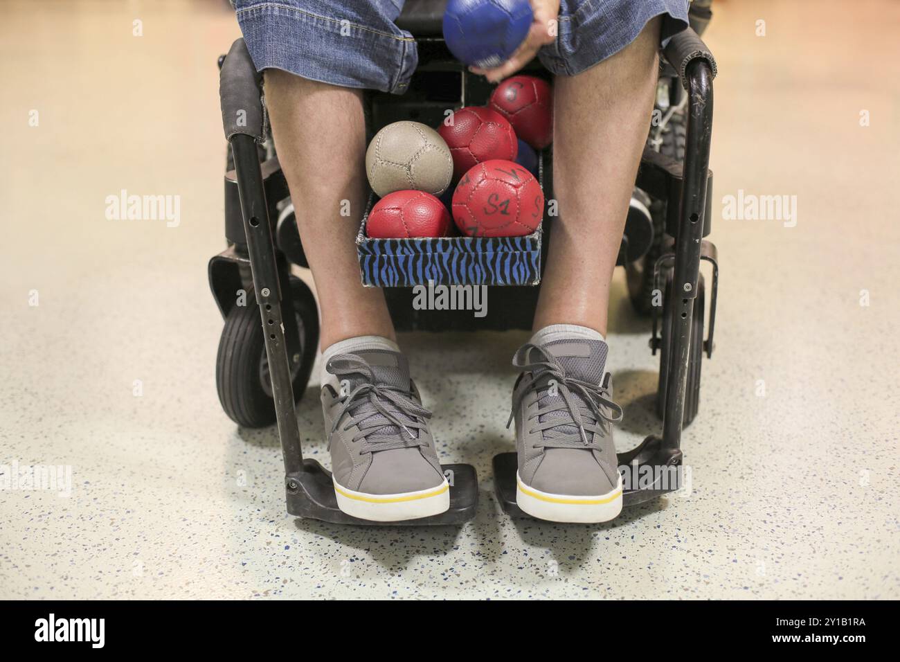 Disabled Boccia player training on a wheelchair Stock Photo - Alamy