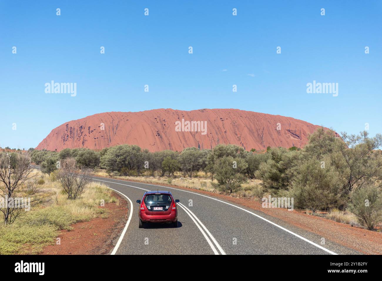 View from approach road, Uluru (Ayers Rock), Uluṟu-Kata Tjuṯa National ...