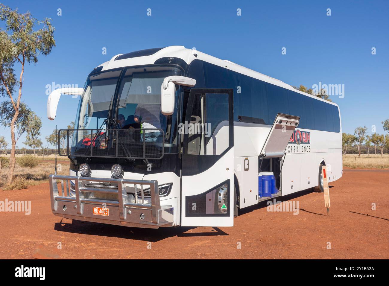 Emu Run tour bus at Mala Walk car park, Uluru (Ayers Rock), Uluṟu-Kata ...