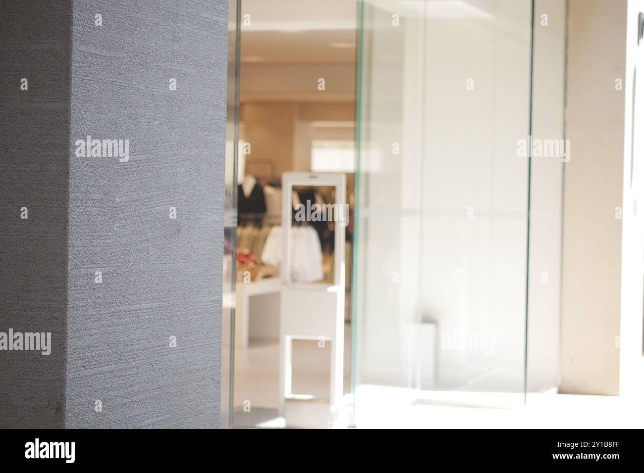 This stylish retail space features modern glass architecture for a ...