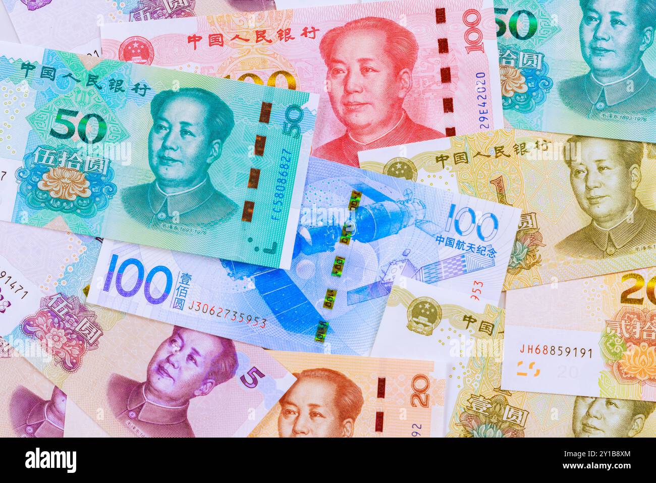Chinese yuan cash banknote in variety of denominations constitutes ...