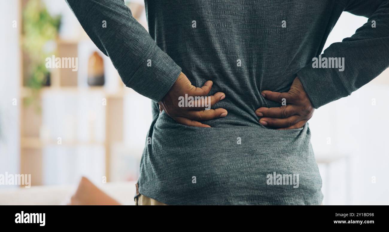 Black person, back and injury with pain for bad posture, muscle tension ...