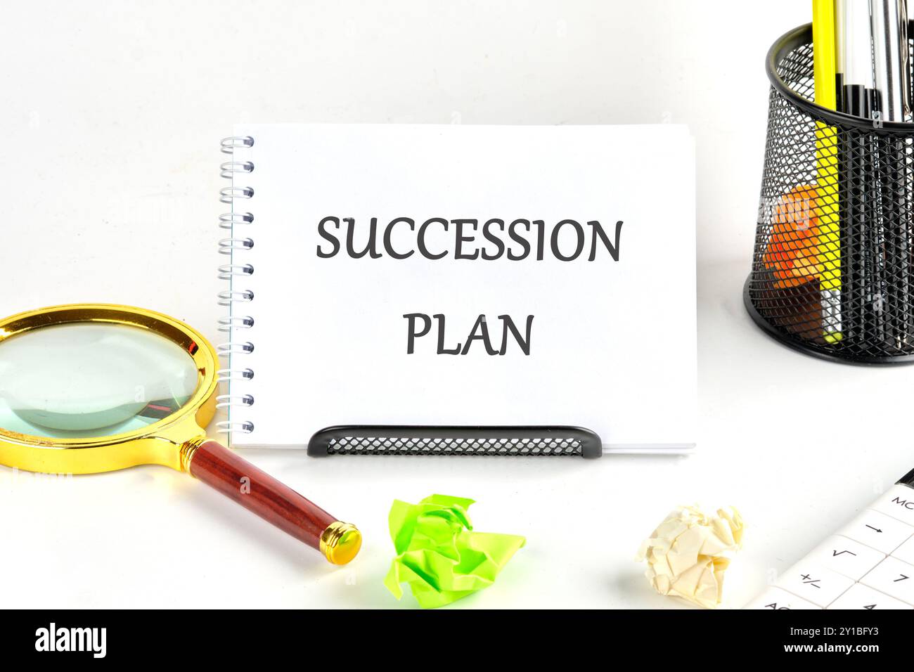 SUCCESSION PLAN word alphabet letters in a notebook on a white ...