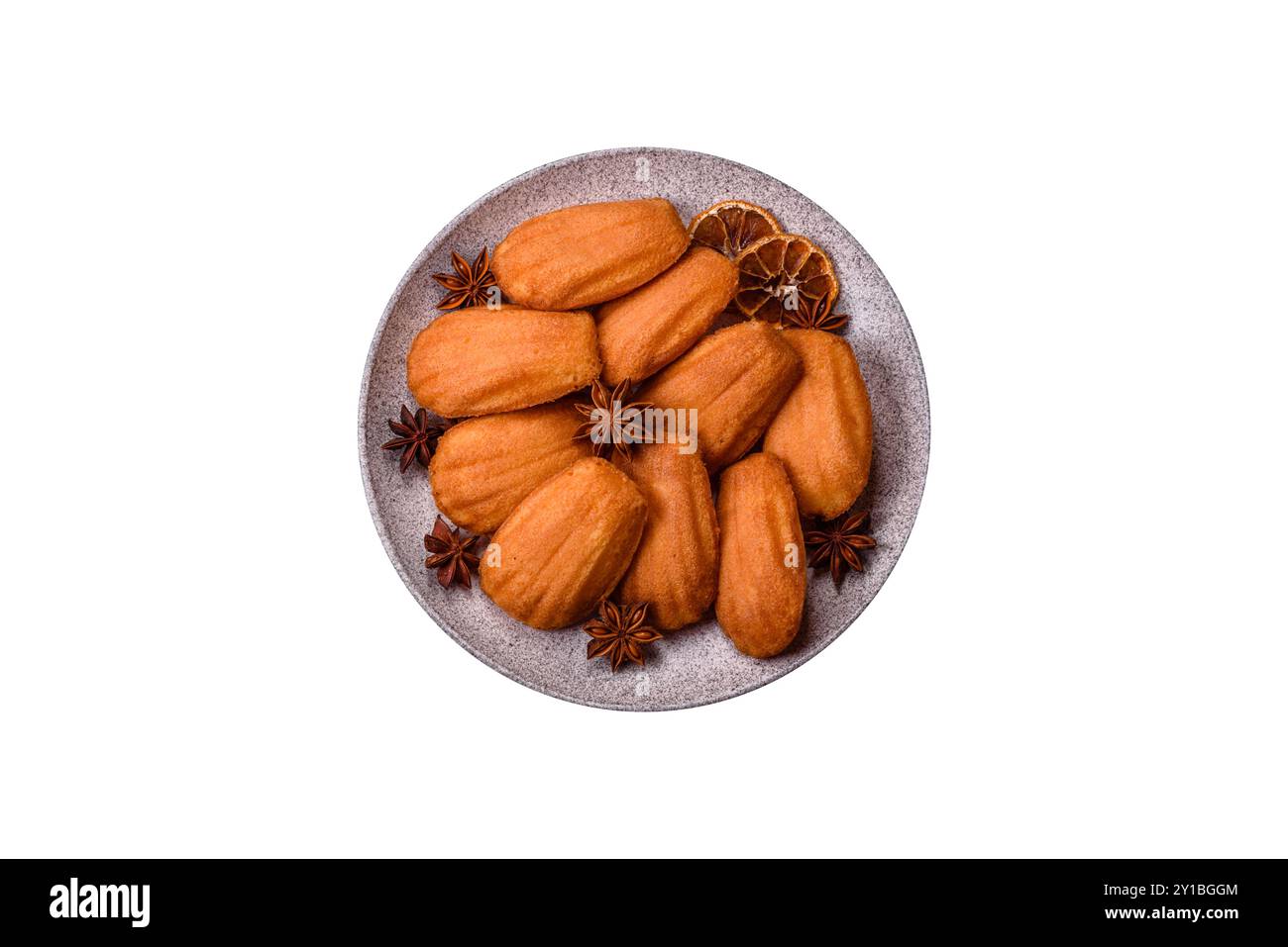 Traditional French madeleine biscuits with nutty flavor on a dark ...