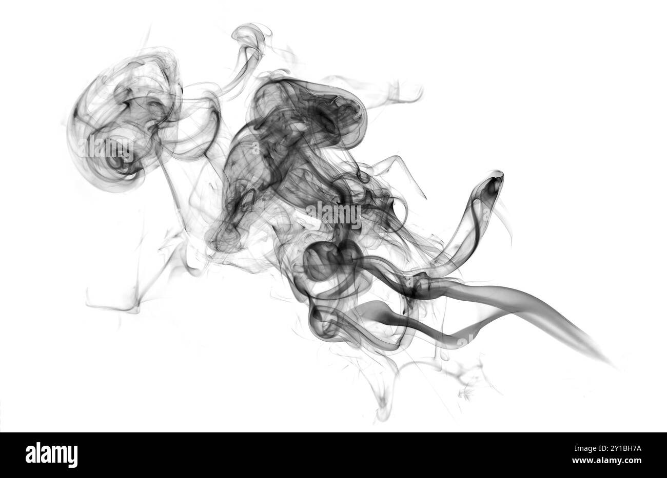 Black smoke creates an ethereal jellyfish-like design against a black ...