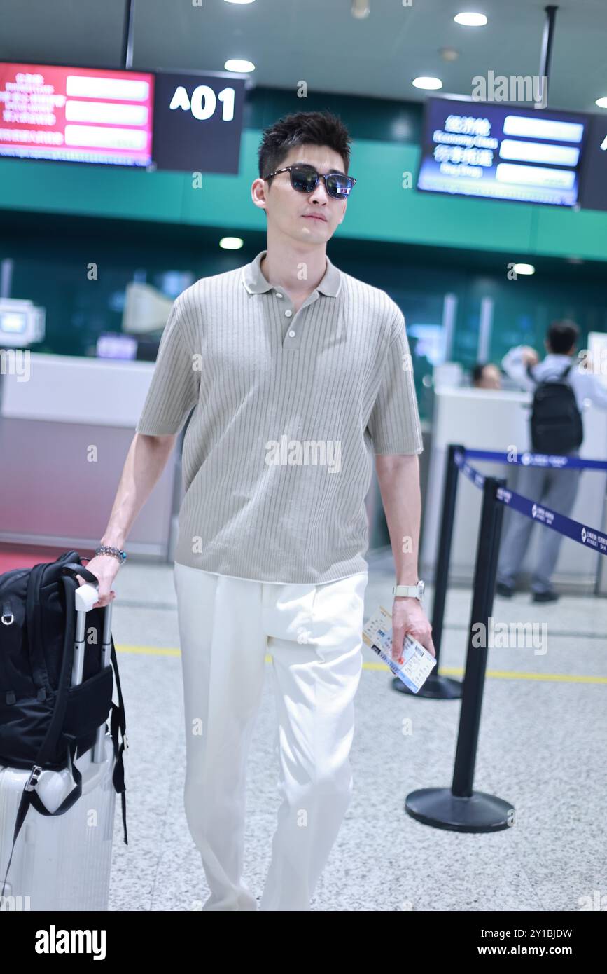 Chinese actor, singer and host Hans Zhang appears at the airport in Shanghai, China. 4th Sep ...