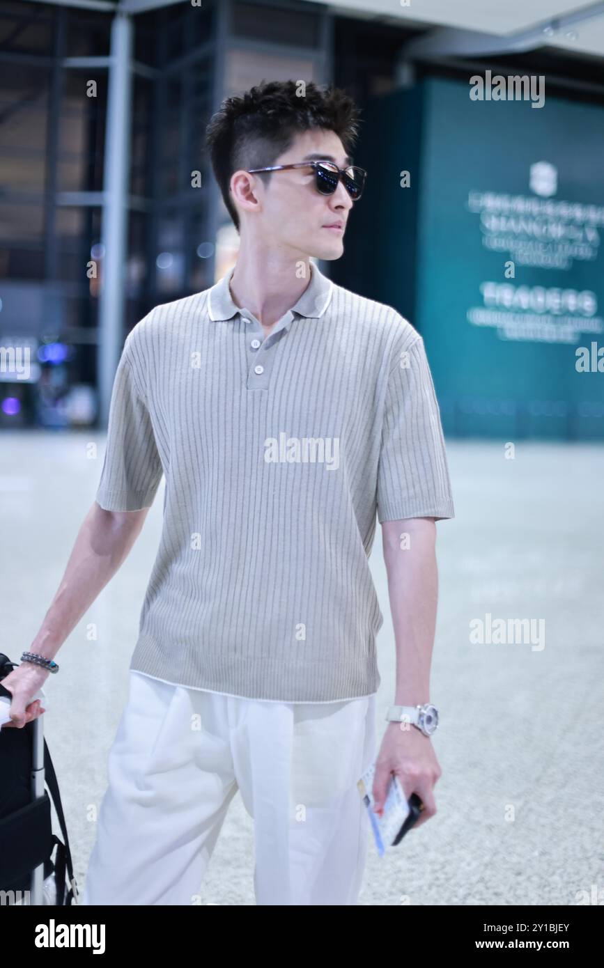 Chinese actor, singer and host Hans Zhang appears at the airport in Shanghai, China. 4th Sep ...