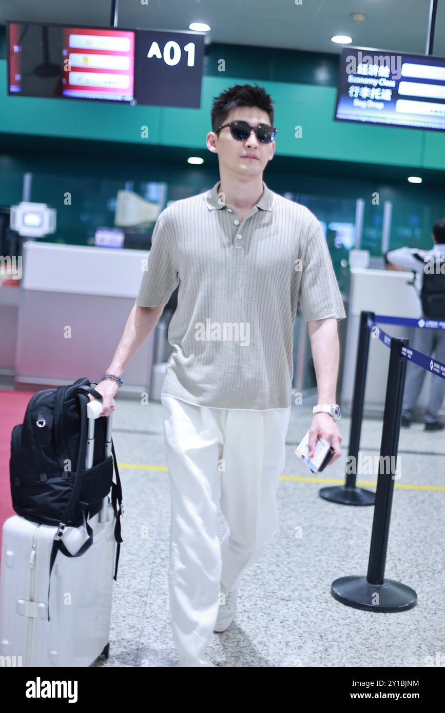 Chinese actor, singer and host Hans Zhang appears at the airport in ...