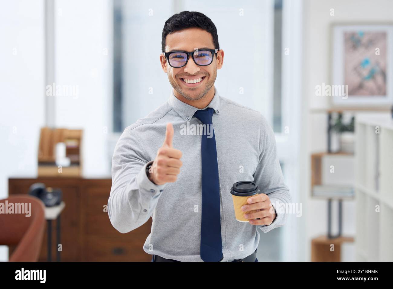 Business man, portrait and thumbs up in office for agreement, thank you ...