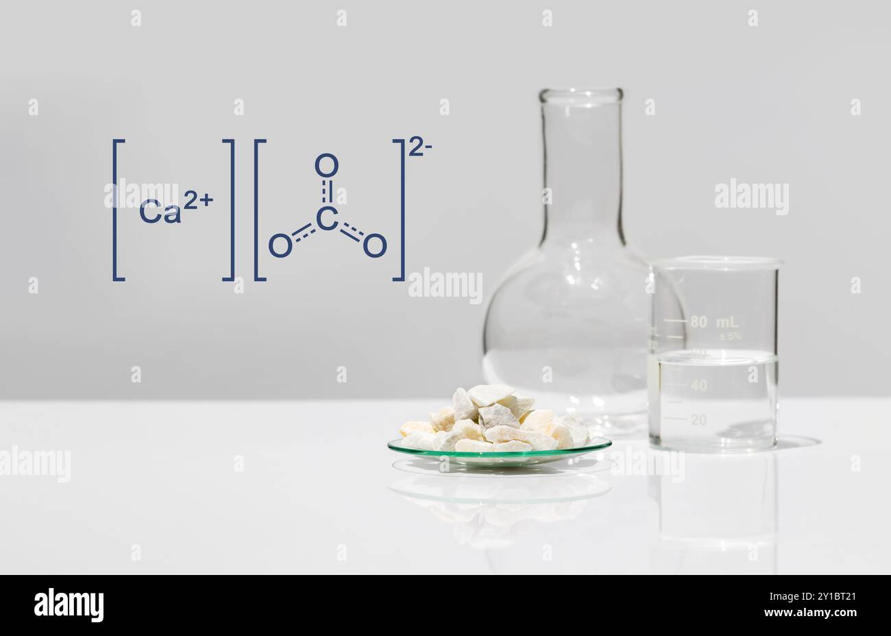Calcium carbonate chip in chemical watch glass with molecular structure ...