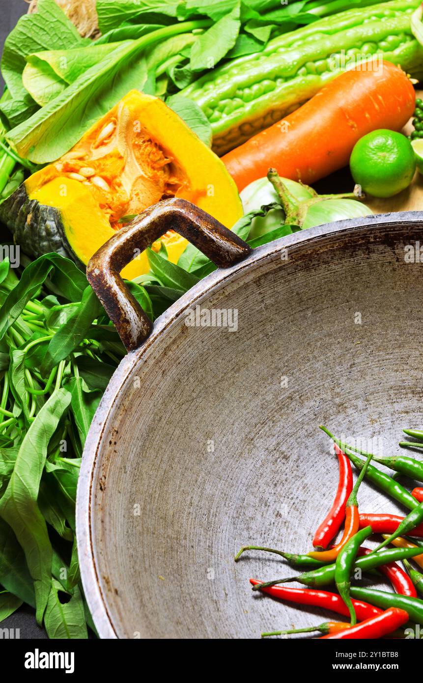 Preparation to asian traditional cooking. Wok and vegetables Stock ...
