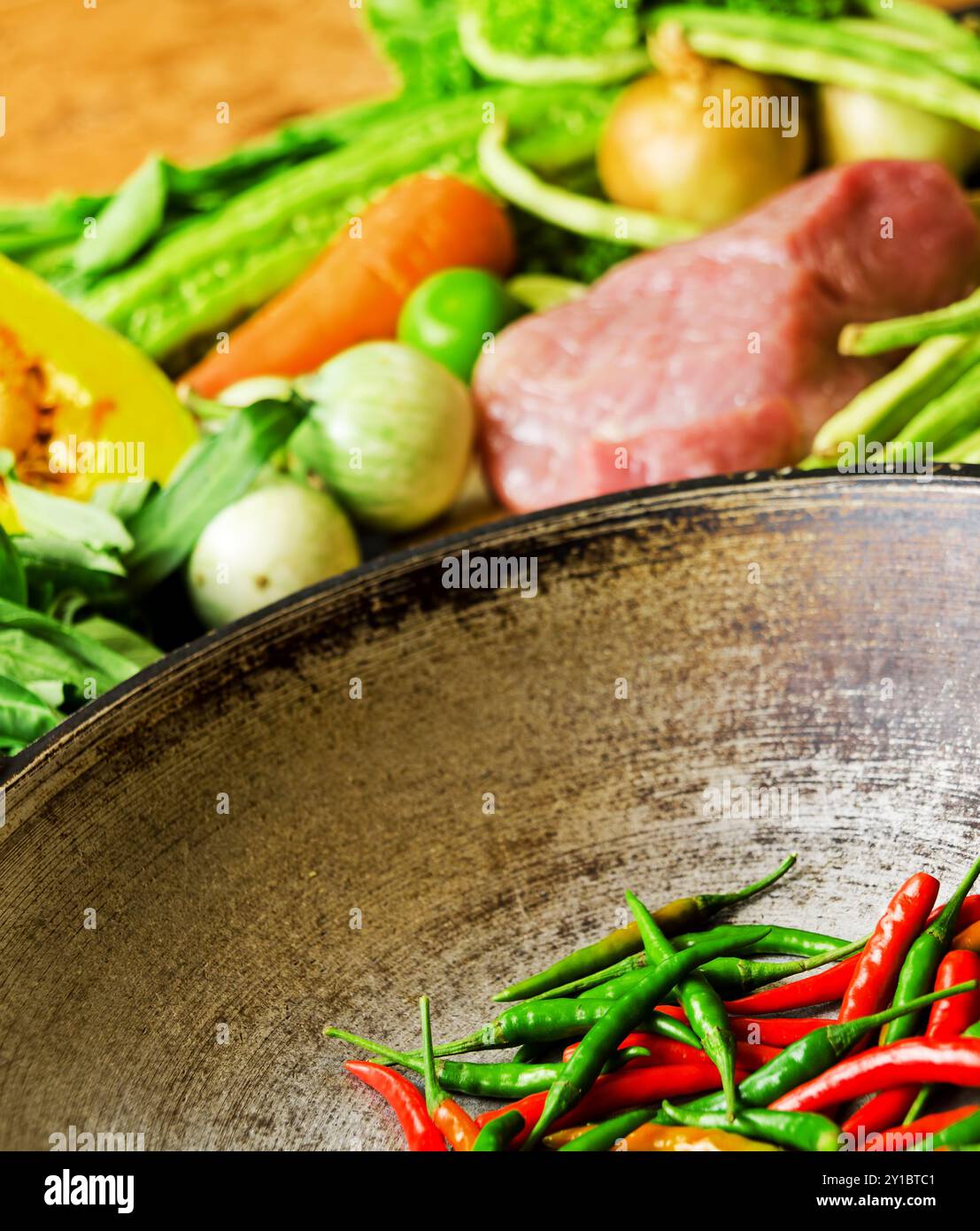 Preparation to asian traditional cooking. Wok and vegetables Stock ...