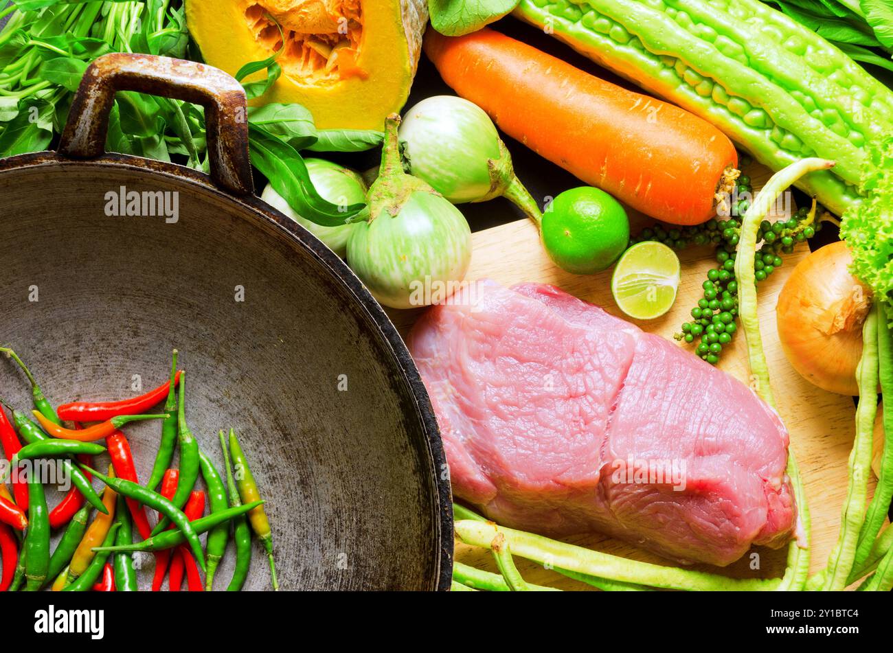 Preparation to asian traditional cooking. Wok and vegetables Stock ...
