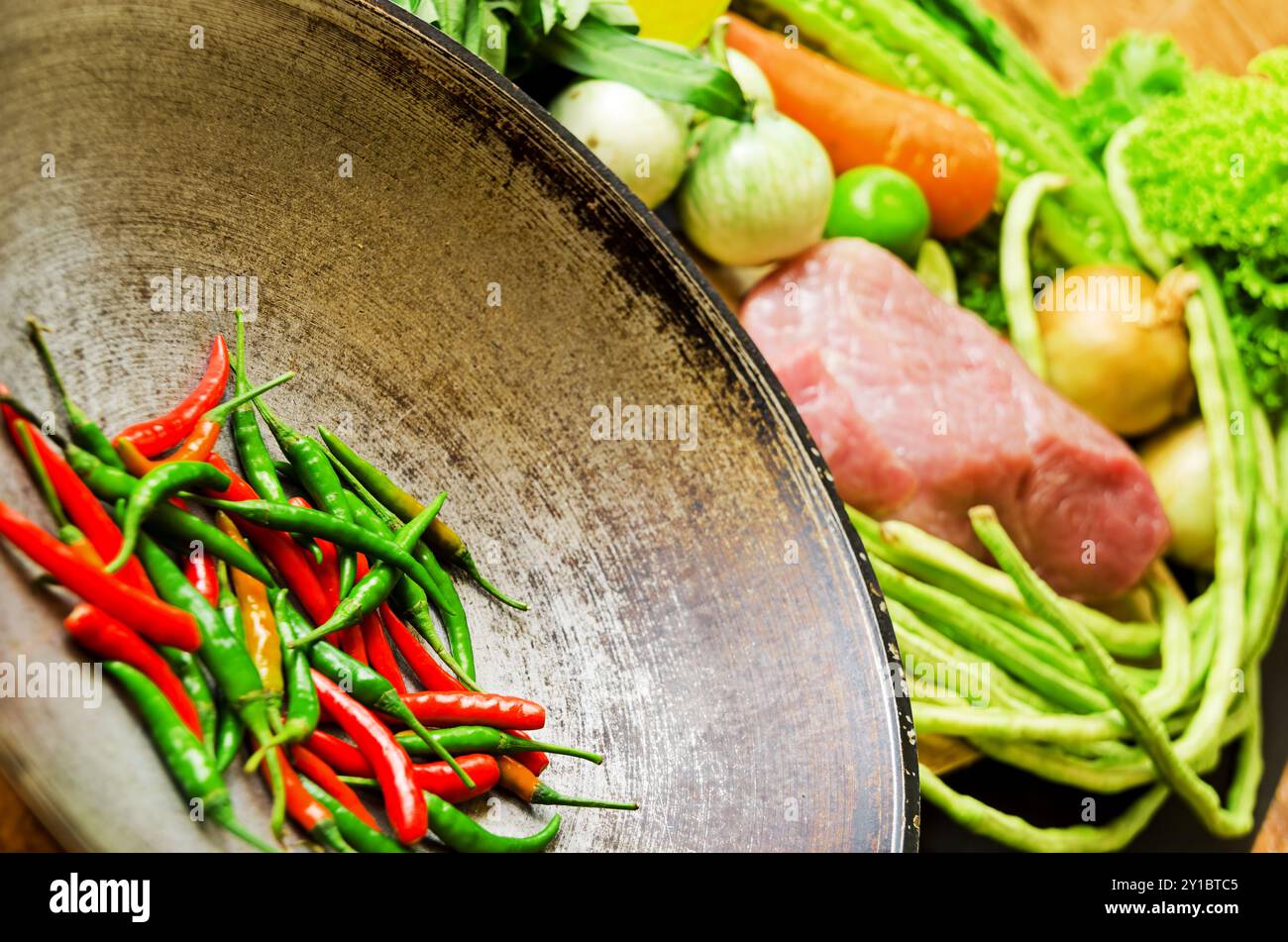 Preparation to asian traditional cooking. Wok and vegetables Stock ...