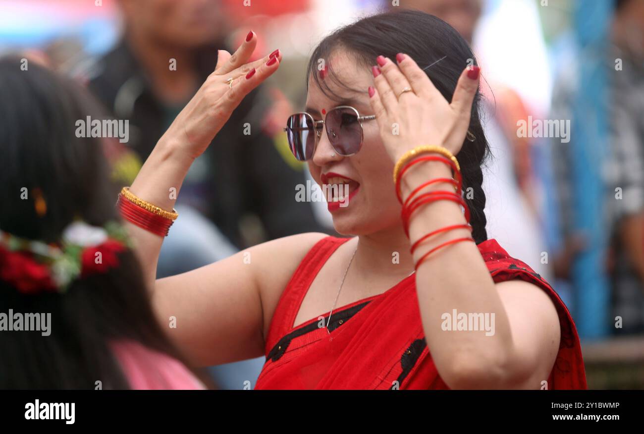 September 6, 2024: A Nepali woman dances in celebration of the Teej festival at a Shiva temple ...