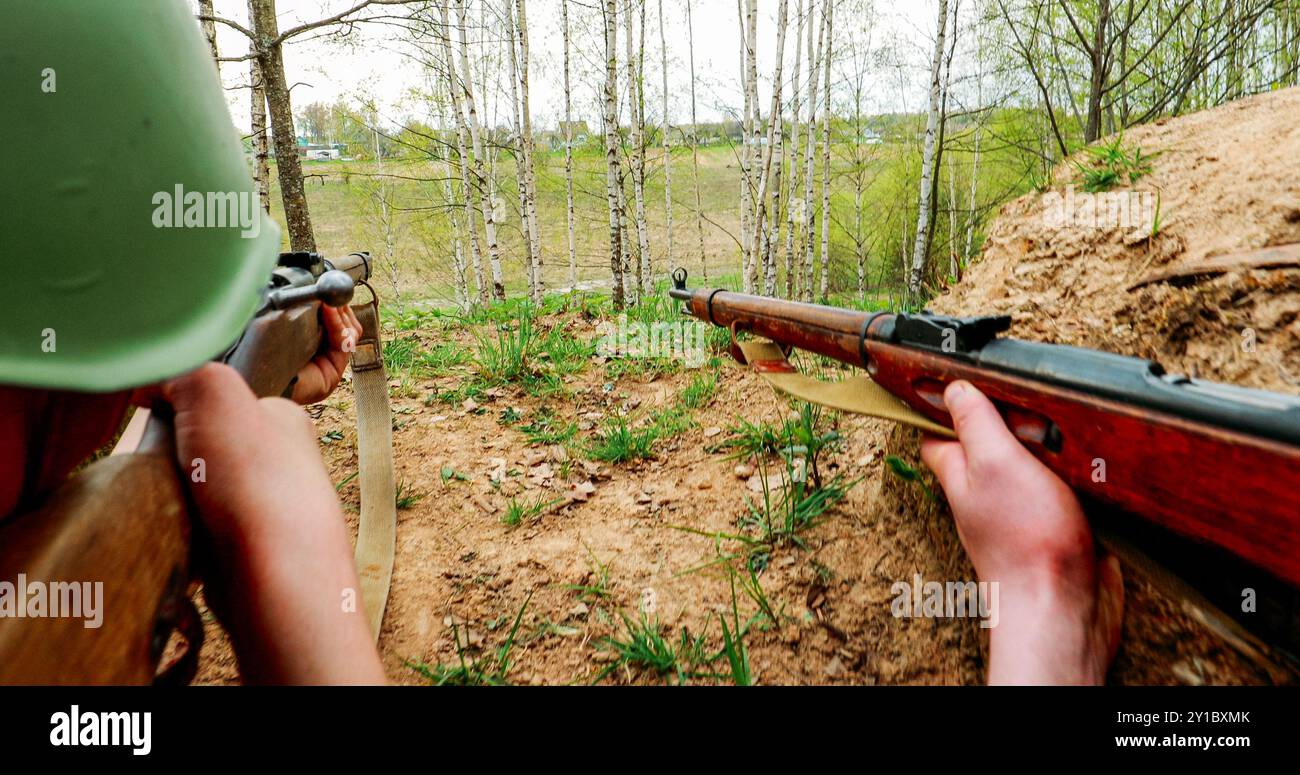 Re-enactors Dressed As Soviet Russian Soldier Aiming With Rifles Stock ...