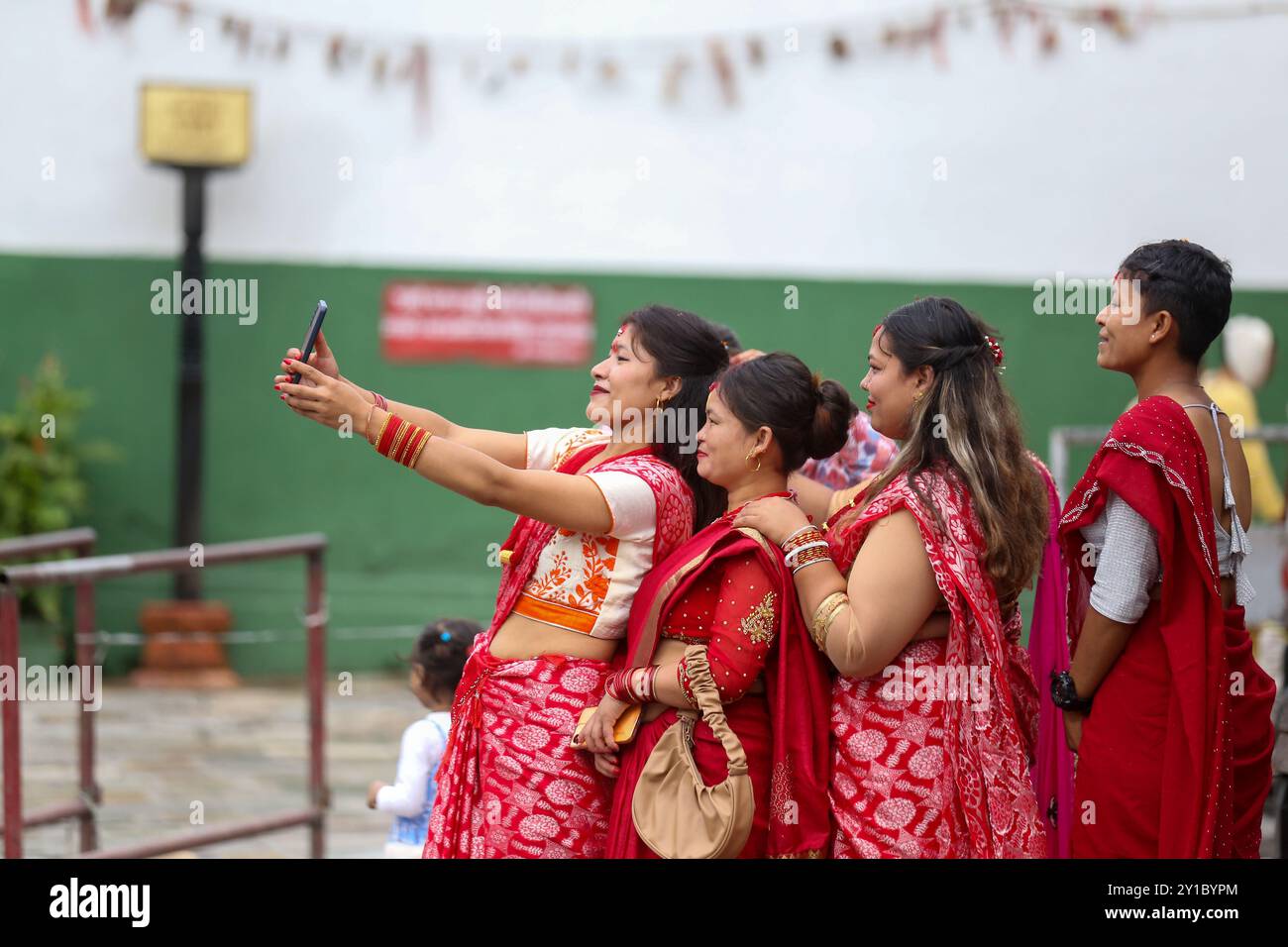 Fasting Nepali Hindu women pose for a selfie in Kathmandu, Nepal, on ...