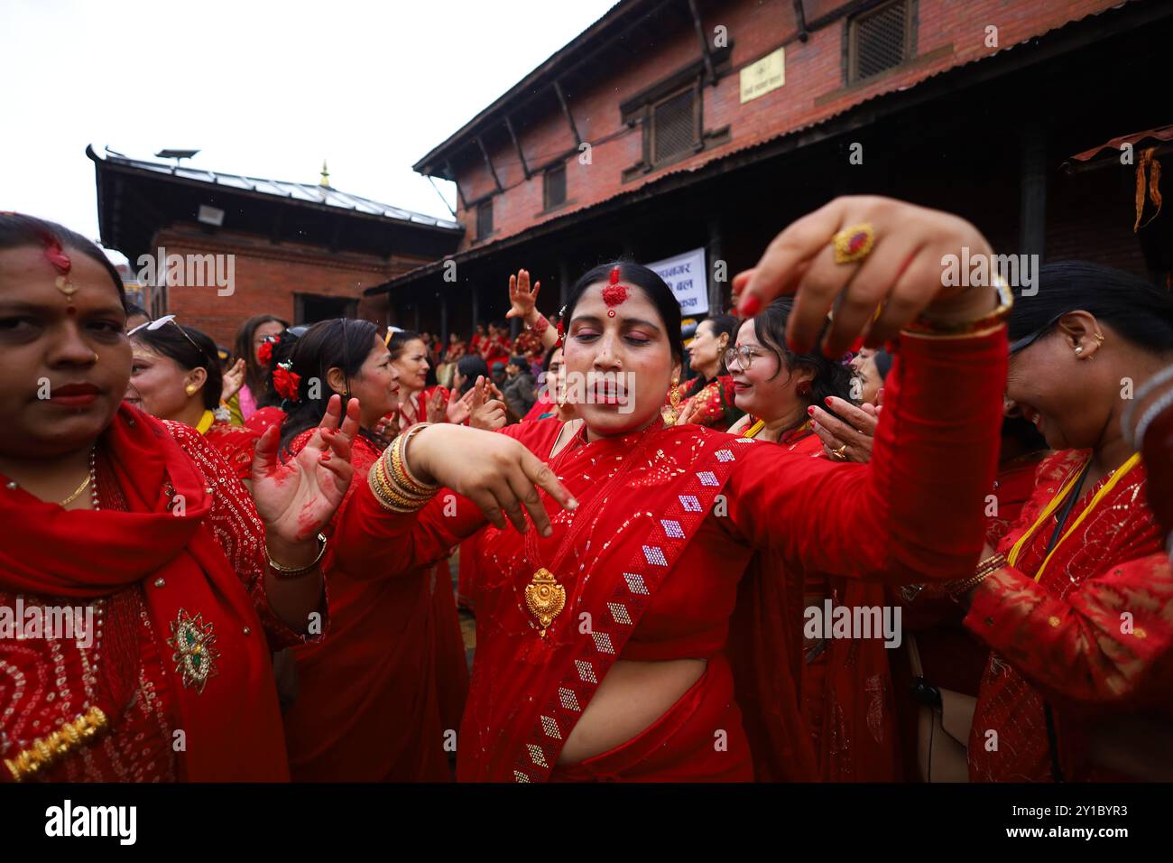 Fasting Nepali Hindu women dance in the premises of Pashupatinath Temple in Kathmandu, Nepal, on ...