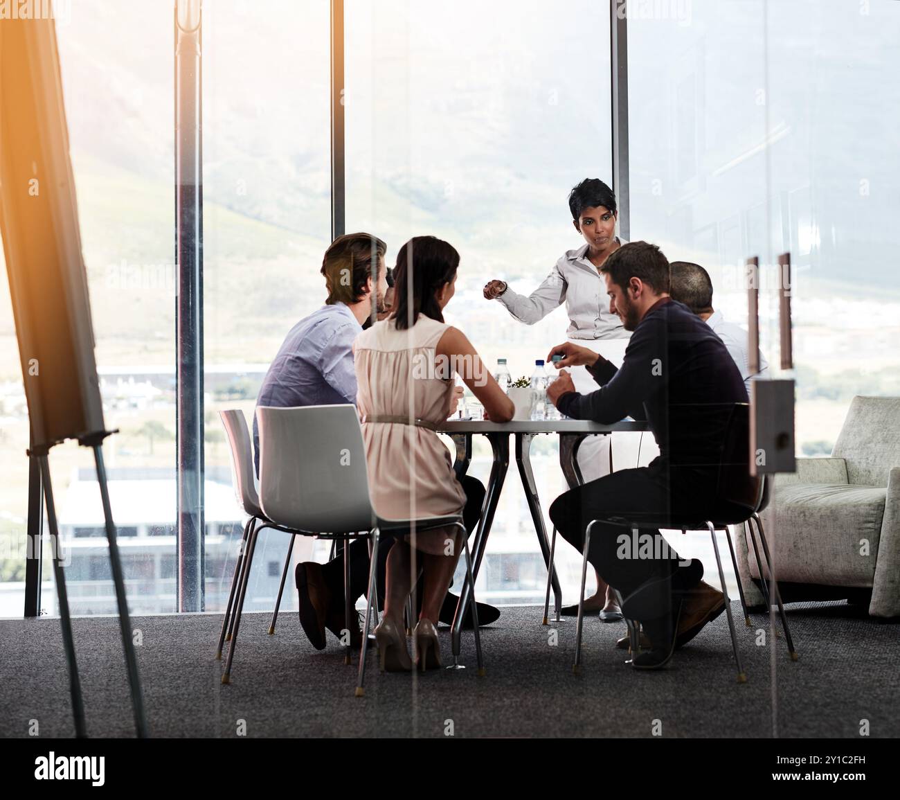 Group, woman and talking in meeting, office and news anchor with ...