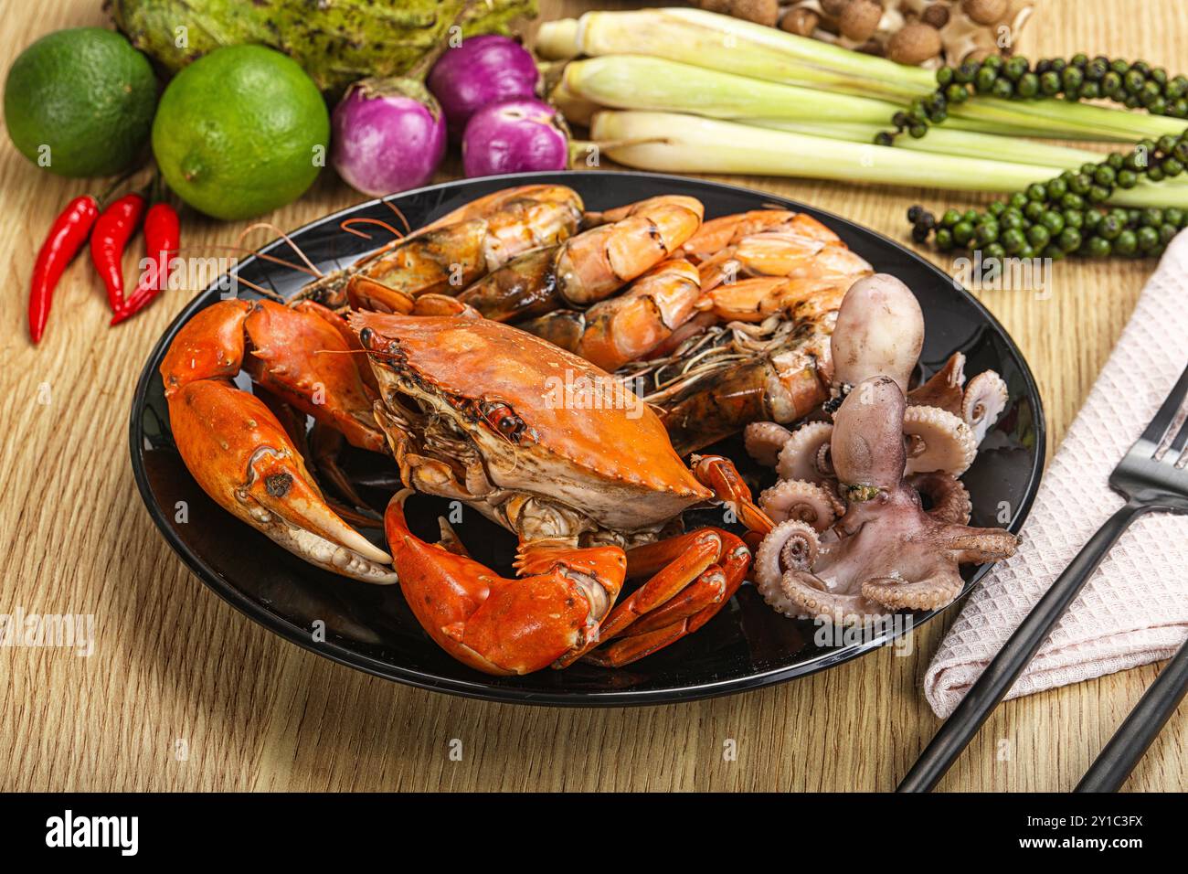 Luxury seafood mix - crab, tiger prawn, octopus Stock Photo - Alamy