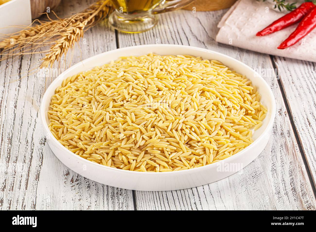 Italian raw dry pasta risoni for cooking Stock Photo - Alamy