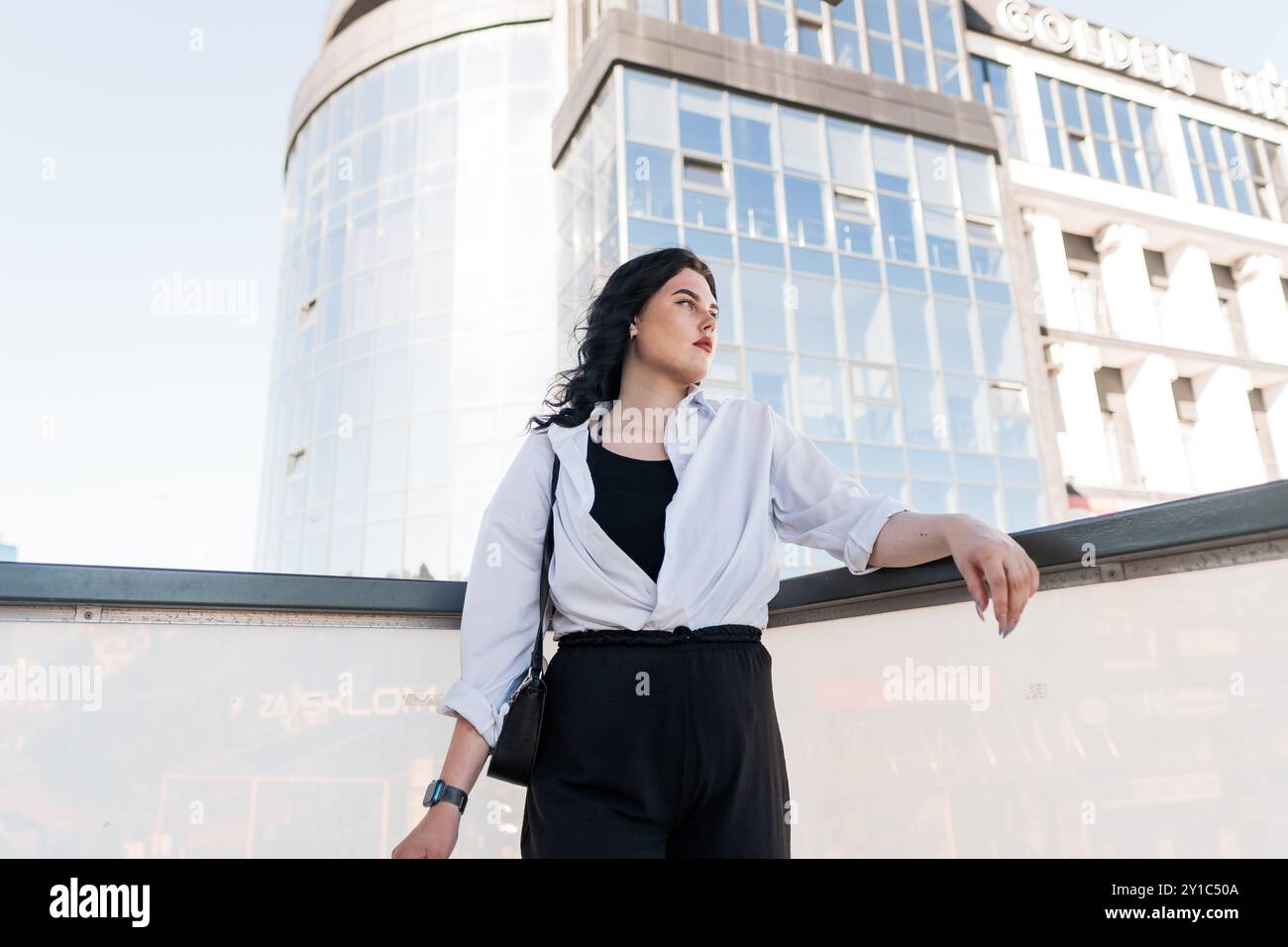 Confident Urban Elegance: Modern Woman in a Metropolitan Setting Stock ...