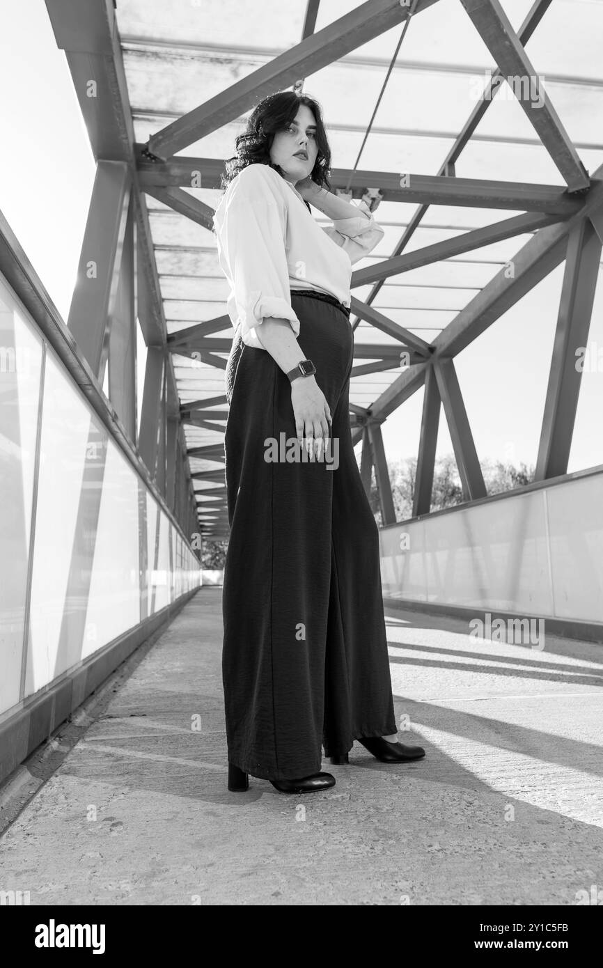Elegant Woman in Modern Geometric Bridge Setting in Black and White ...