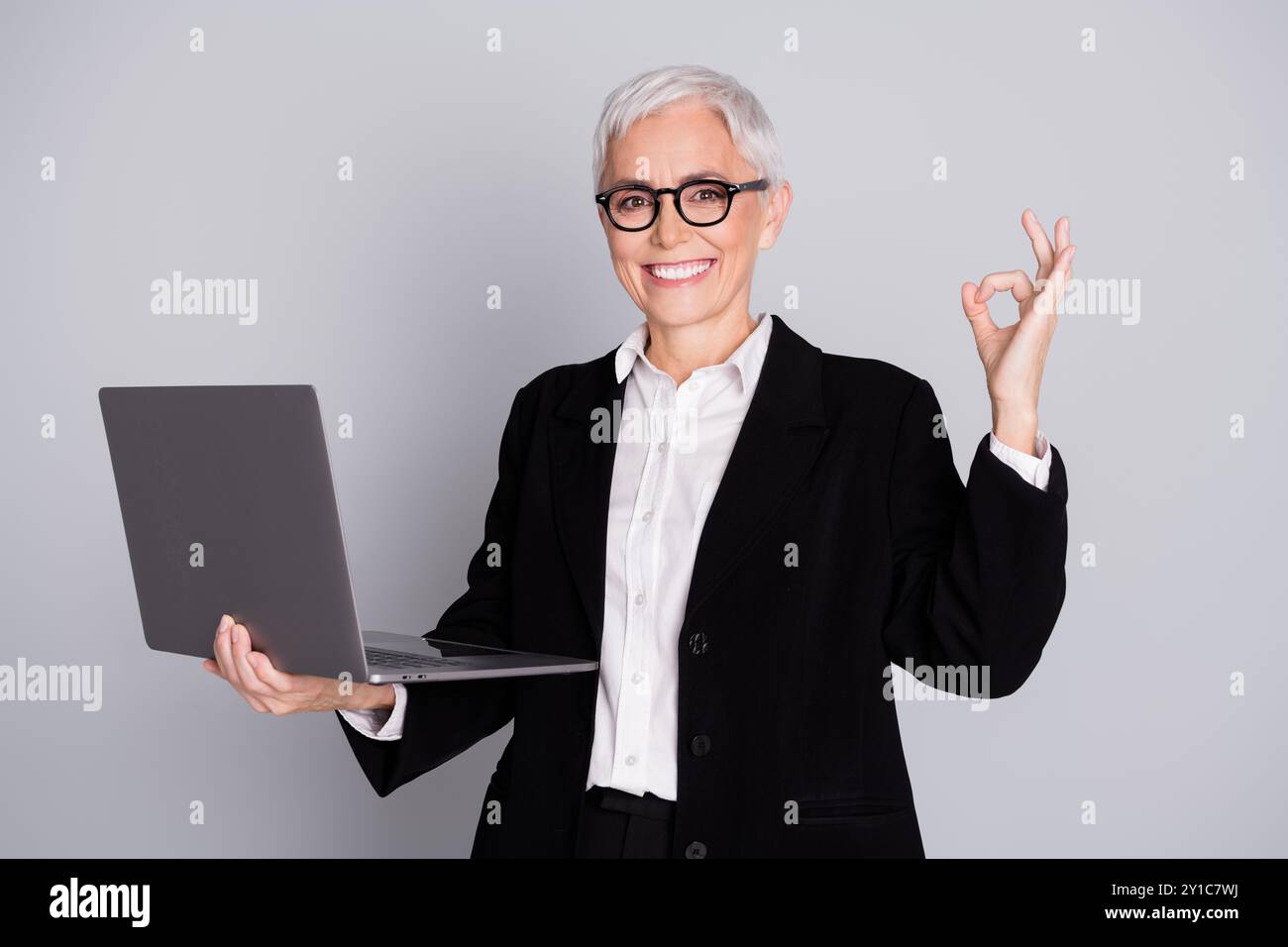 Portrait of charming successful gorgeous office lady wear black stylish ...