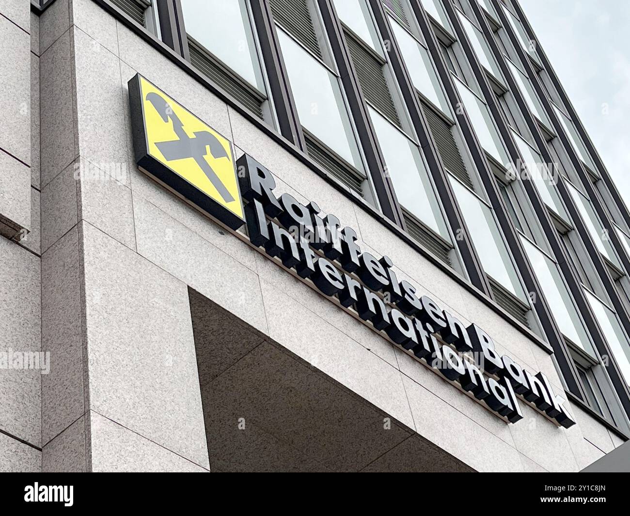 Wien, Austria. 04th July, 2024. The lettering and logo of Raiffeisen ...