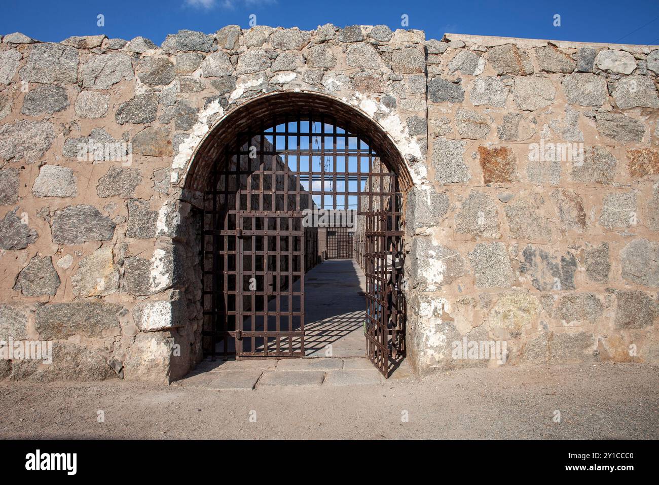 Yuma Territorial Prison rock walls and iron gates Stock Photo - Alamy