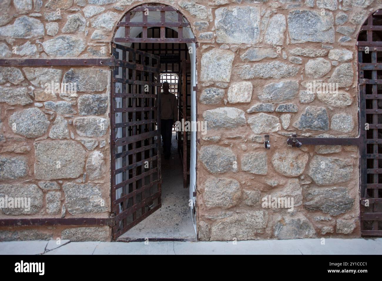 Yuma Territorial Prison rock walls and iron gates Stock Photo - Alamy