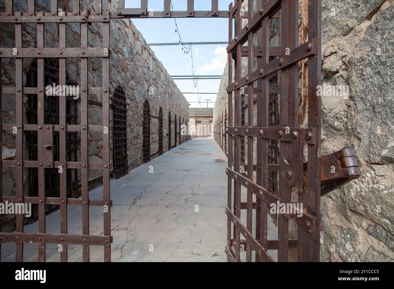 Yuma Territorial Prison rock walls and iron gates Stock Photo - Alamy