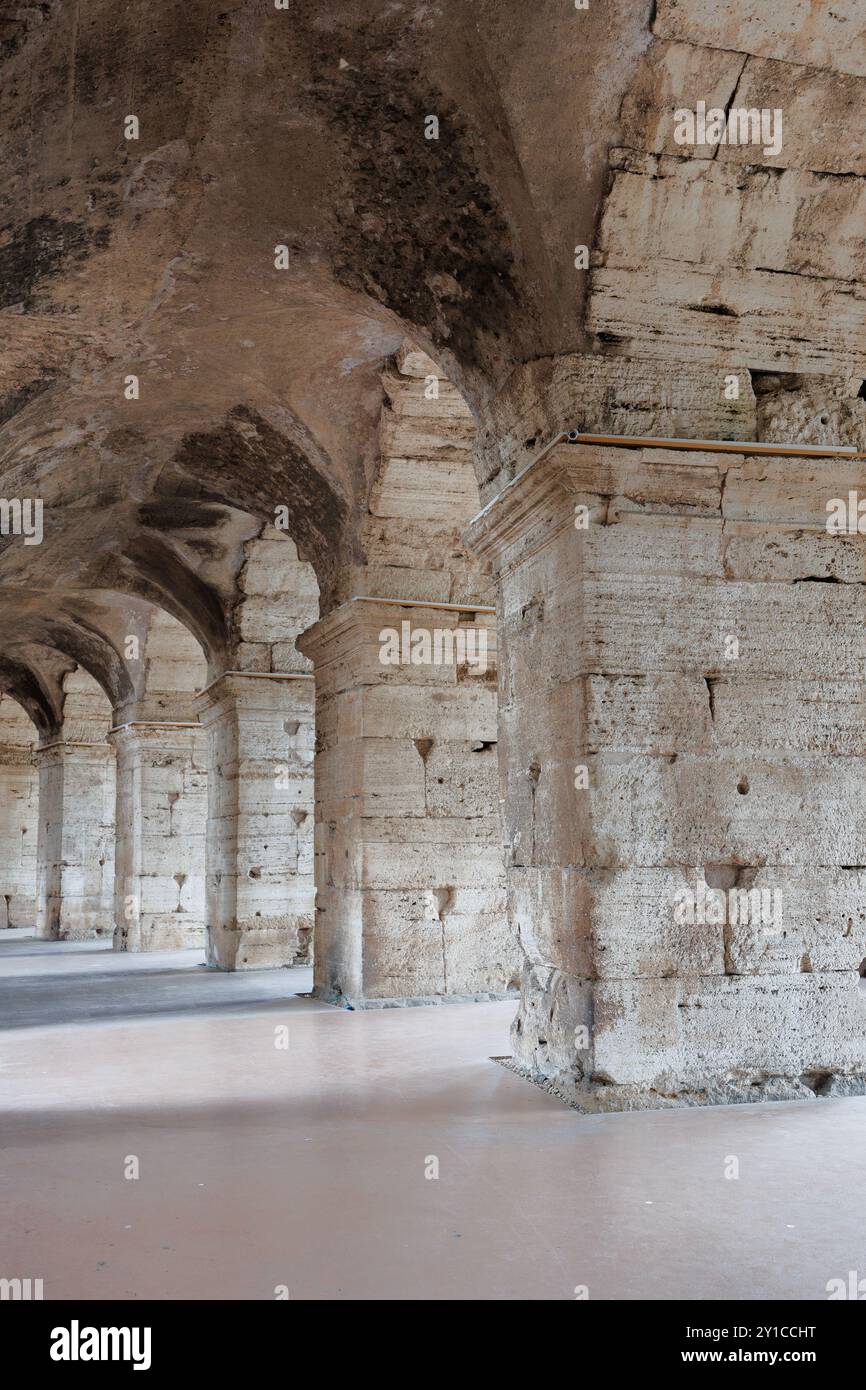 Arches and stone columns inside of ancient Colosseum Stock Photo - Alamy