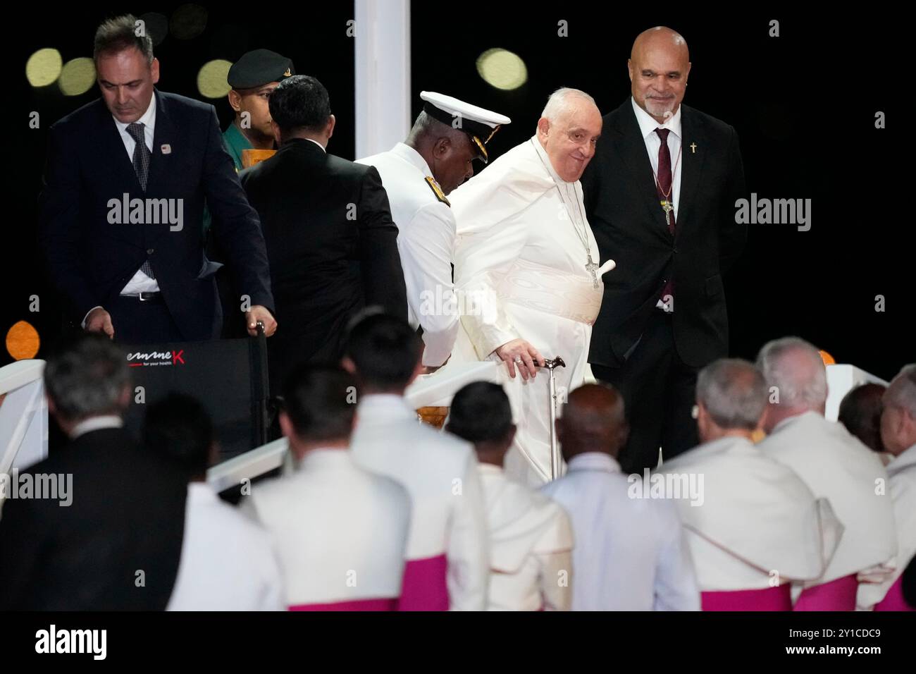 Papua New Guinea's Deputy Prime Minister John Rosso, right, welcomes ...
