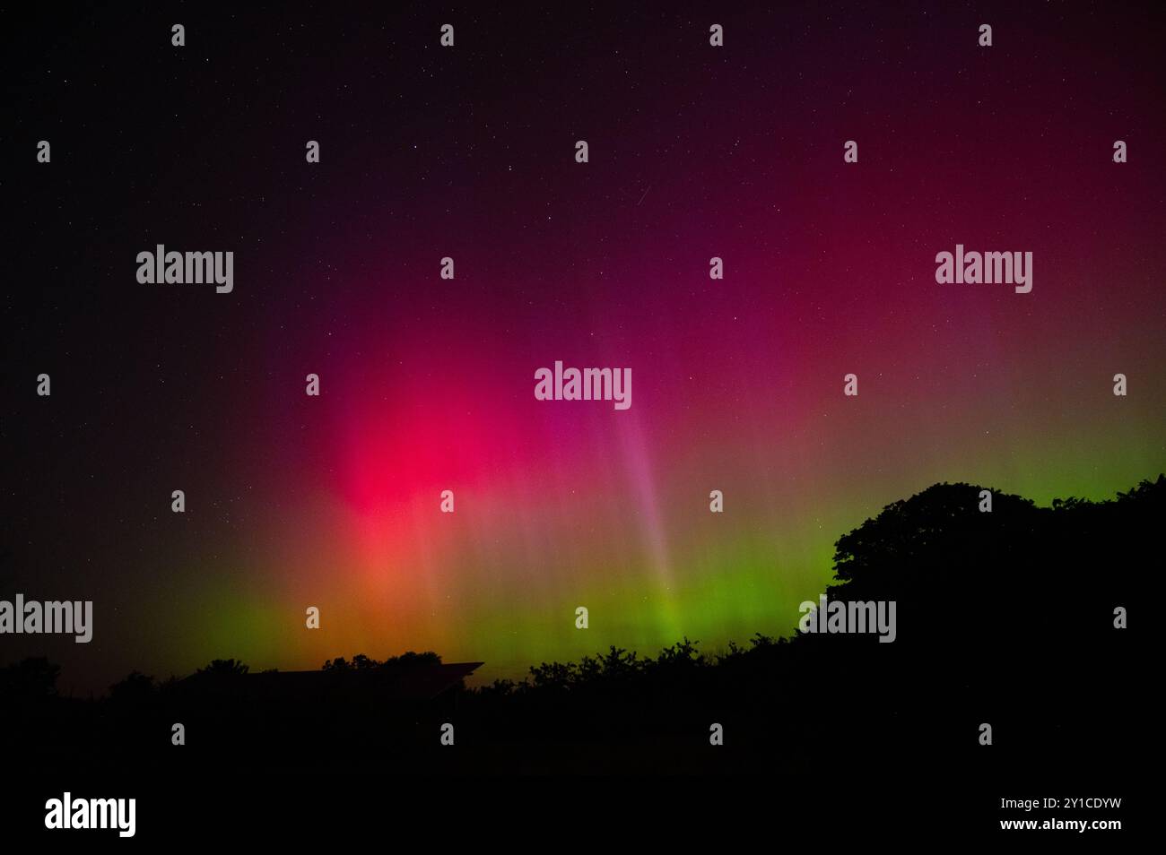 Bright pink and red aurora borealis with Big Dipper visible Stock Photo ...