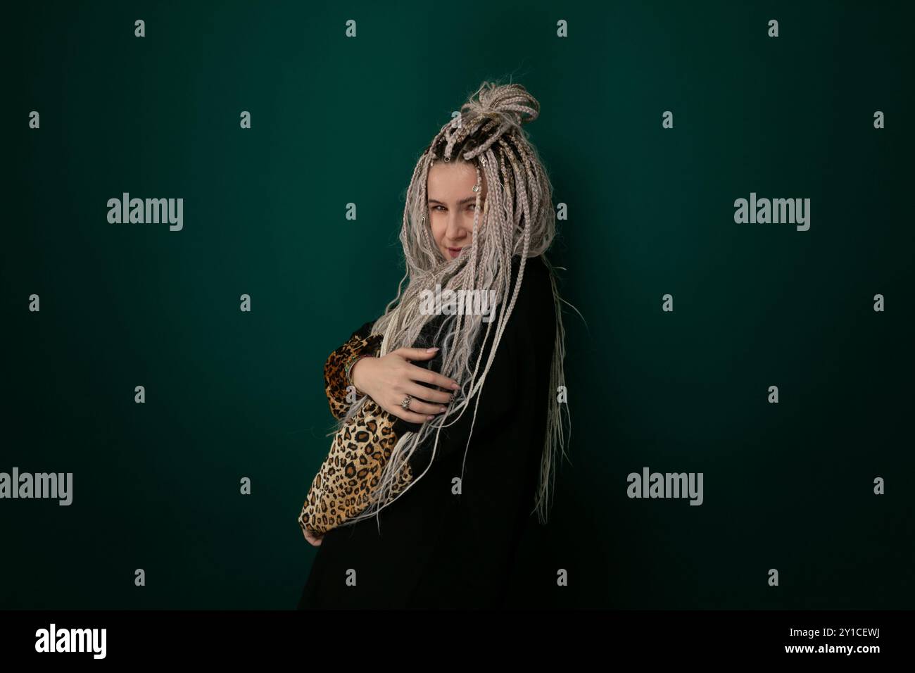 Woman With Long Hair Carrying Leopard Print Purse Stock Photo - Alamy