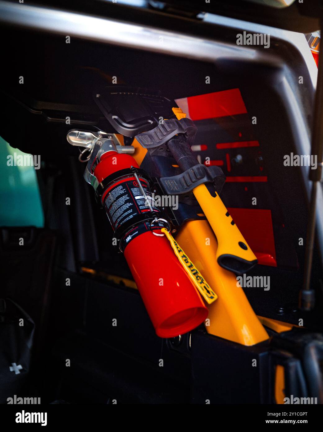 Fire extinguisher and axe mounted in trunk of off-road truck Stock ...