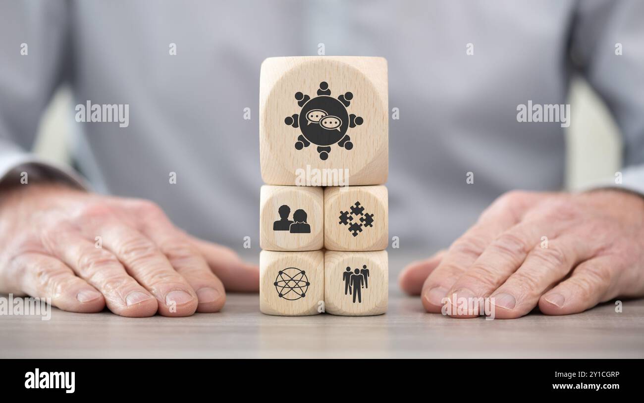 Wooden blocks with symbol of meeting concept Stock Photo - Alamy