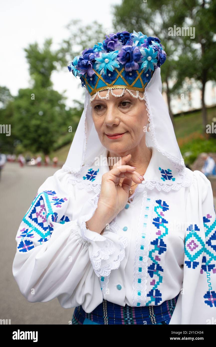 A celebration of Belarusian culture.An elderly Slavic woman in national ...
