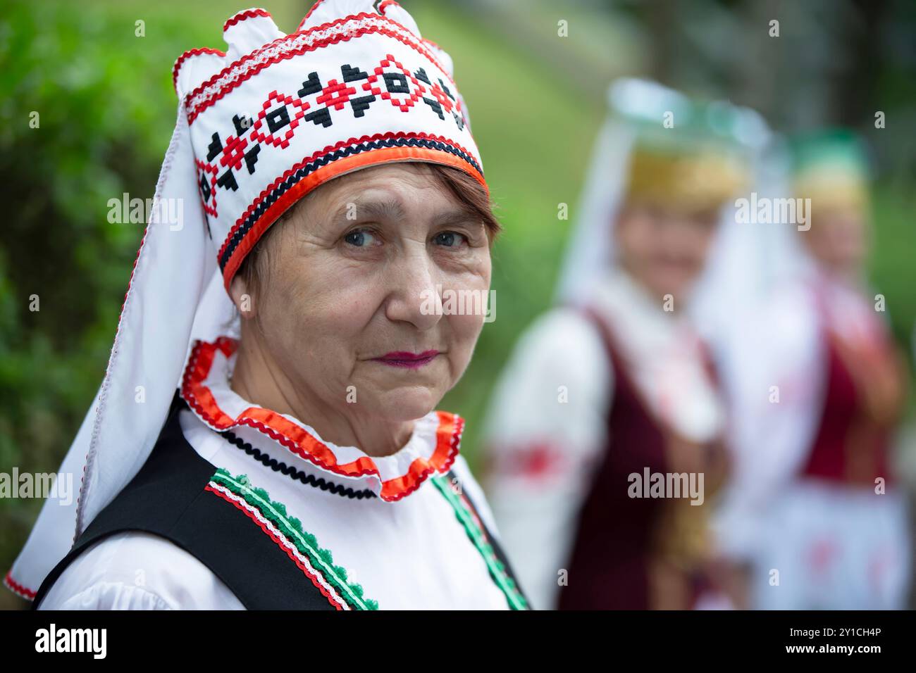A celebration of Belarusian culture.An elderly Slavic woman in national ...