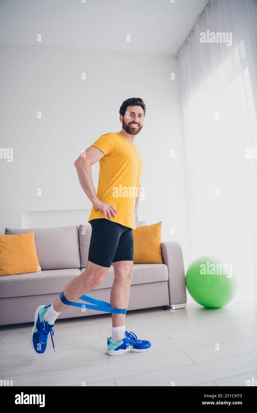 Photo of attractive nice man wear sportswear doing physical exercises ...