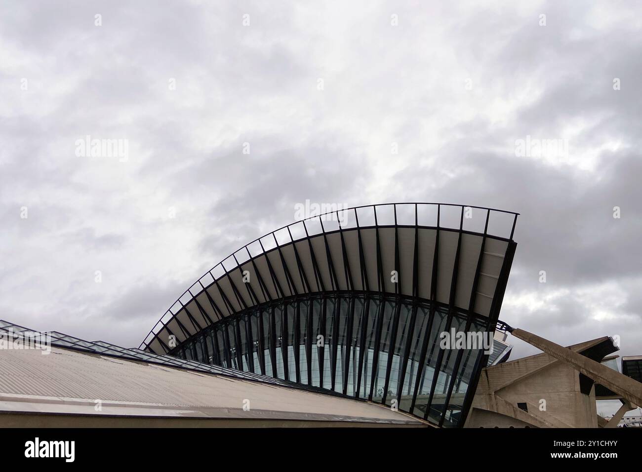 View of the roof of a big modern building on a cloudy day, steel ...