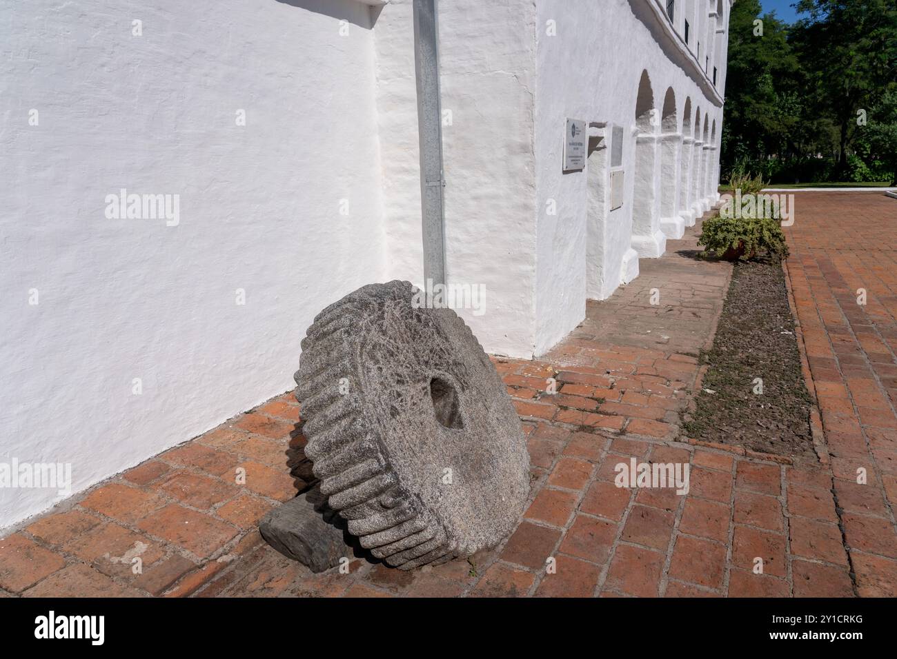 An antique stone mill wheel at the Museum of the Sugar Industry, San ...