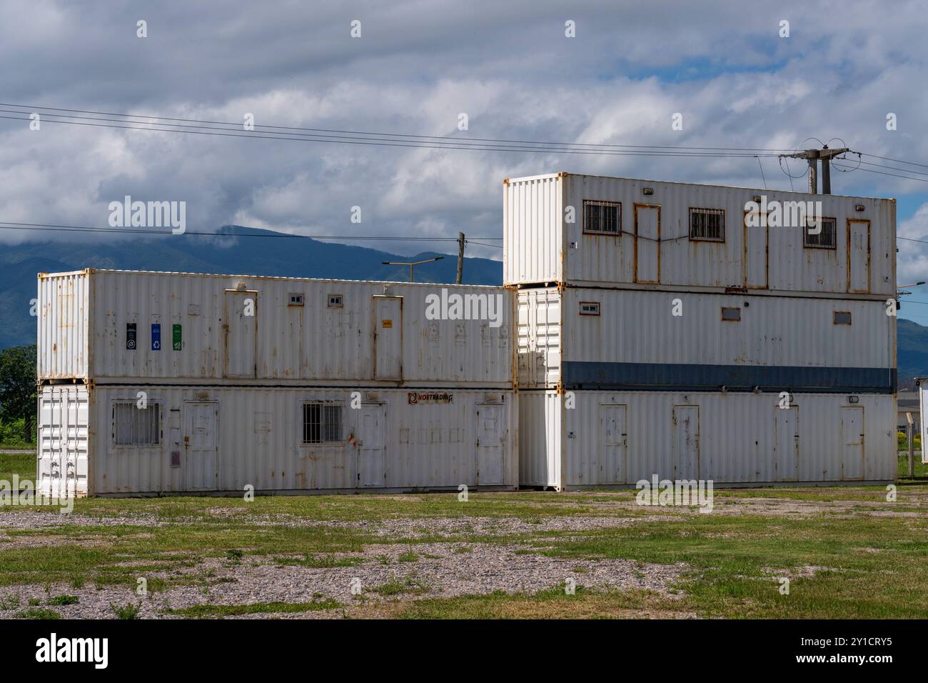 Industrial buildings made from shipping containers stacked in an ...