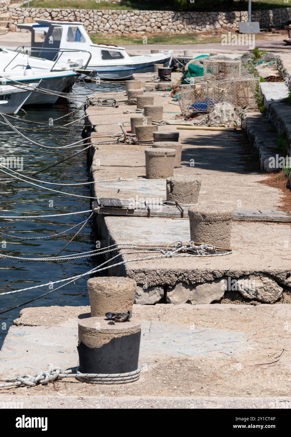 Mooring for boats, concrete dock Stock Photo - Alamy