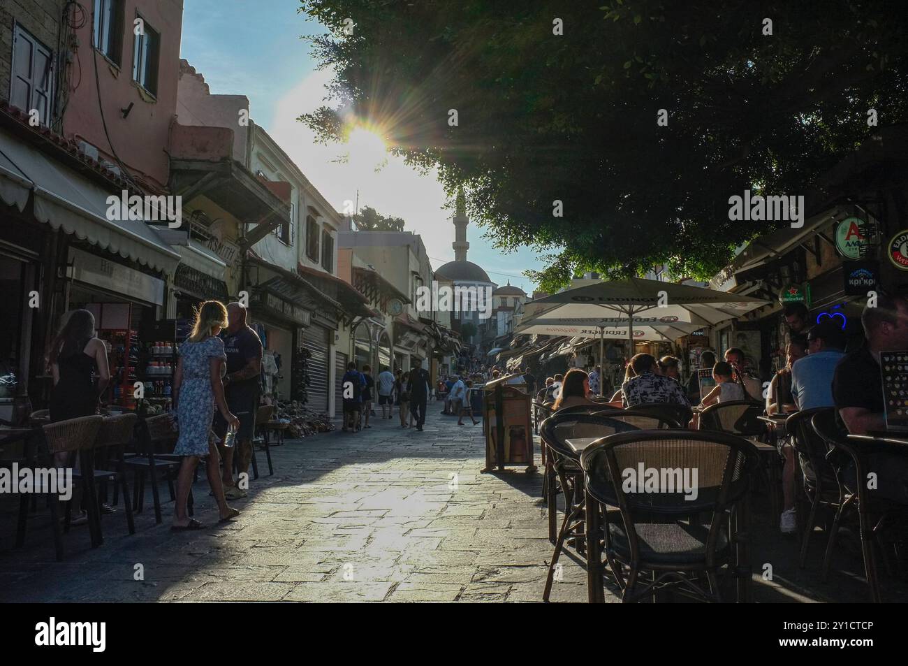 people eating in cafes & the Suleiman Mosque in the distance on ...