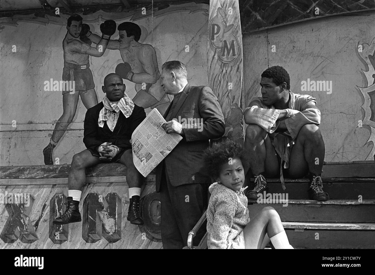 Pat McKeowen's fairground boxing booth show. L to R. Prize fighters Sid ...